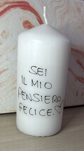 candela con scritta
