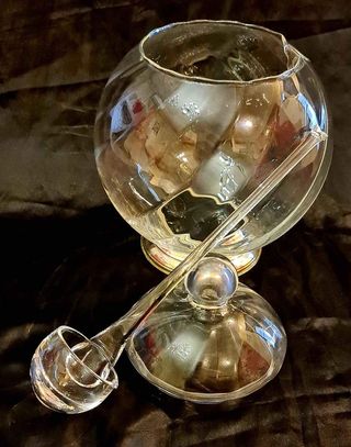 Raffinata ampolla +mestolo cristallo e argento 800