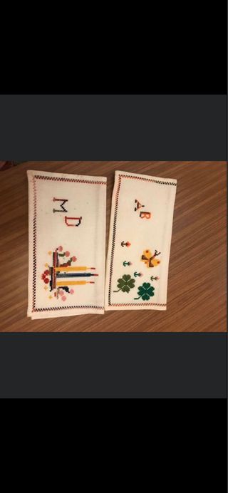 Borsette porta tovaglioli ricamate a mano