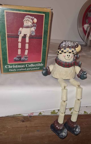 Pupazzo di neve seduto