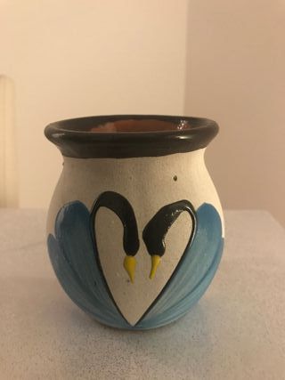Vaso con manico