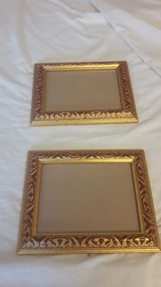 Cornici portafoto a muro dorate