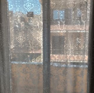 Tenda traforata per porta finestra