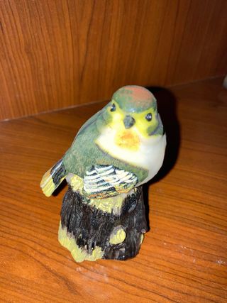 uccello in resina che canta