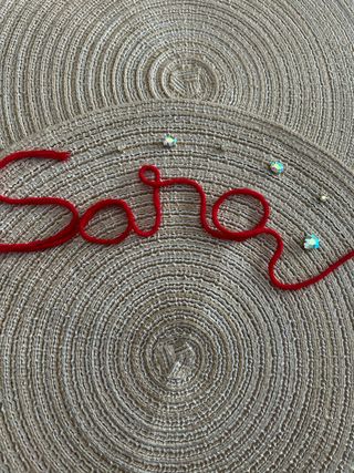 Tovaglietta con nome e Swarovski boreali