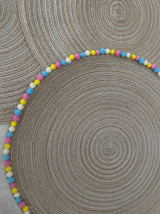 Tovaglietta con pon pom e nome