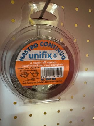 bobina nastro continuo inox con occhielli