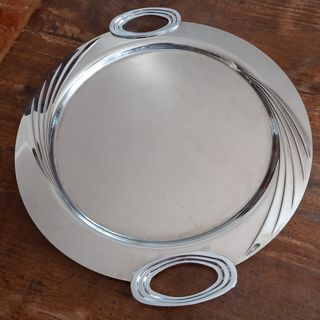 Vassoio rotondo con manici lavorati