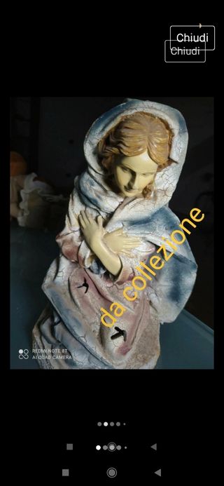 Statuette. Porta  candela