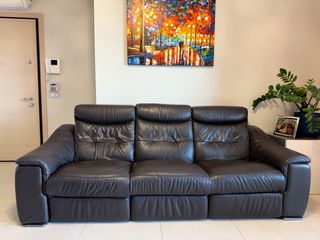 Divano in pelle premium con triplo movimento relax