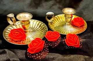 Coppia di bugie portacandele in metallo argentato