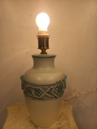 Lumetto in ceramica con anelli laterali