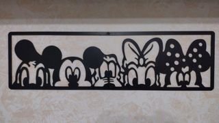 Targhetta in mdf con i personaggi Disney.