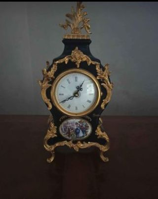 Orologio in porcellana di Limoges Masoni