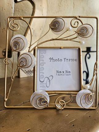 Portafoto in metallo ed abalone shell