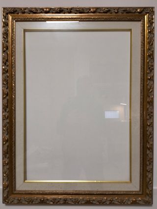 Cornice dorata con vetro