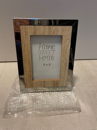 Cornice in argento e legno