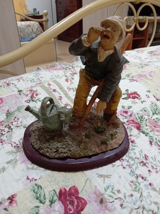 Bellissimo Soprammobile di Uomo Che Lavora