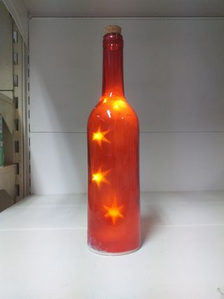 Bottiglia natale con luci