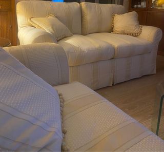 coppia di divani in tessuto