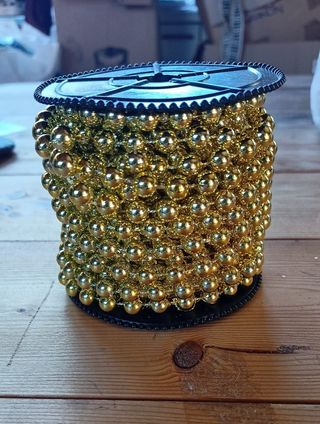 1 rocchetto filo di perle plastica oro