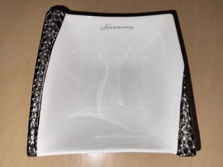 Svuotatasche in ceramica e acciaio.Nuovo