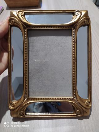 Cornice portafoto dorata con specchi