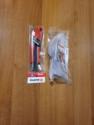 Occhiali di protezione e taglierino