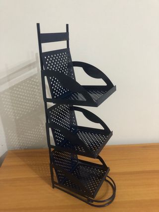 espositore blu notte in ferro della Nestlé