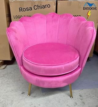 poltrona a forma di conchiglia