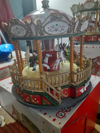 Giostra natale in movimento cavallini