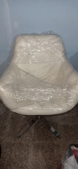 Poltrona girevole in ecopelle