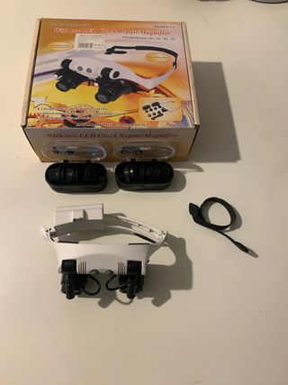Occhiali da riparazione con lenti e LED
