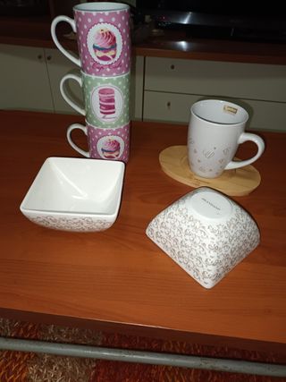 4 tazze  e 2 ciotolinein porcellana