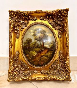 Quadro ovale con cornice in legno