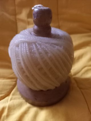 Candela a forma di gomitolo