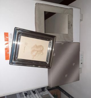 Cornice e specchio due in uno in argento