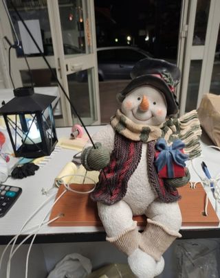 pupazzo da neve con altalena