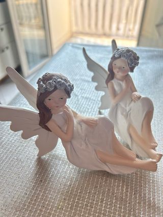 angeli bianco espositori