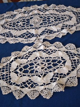 Centri ricamati a mano