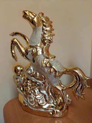 Cavallino in ceramica color oro