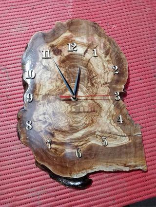 orologio da parete in legno di ulivo