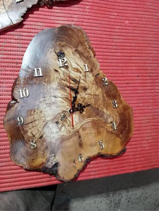 orologio da parete in legno di ulivo