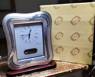 Cornice argento 925 con orologio a pendolo