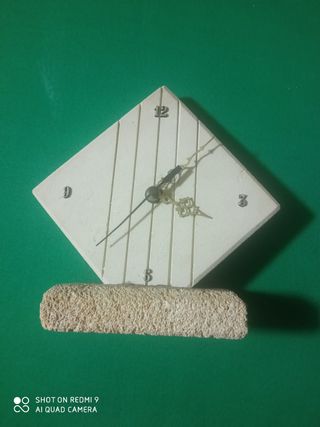 Orologio in pietra leccese e carparo