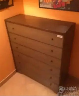 Letto con mobiletto a scomparsa