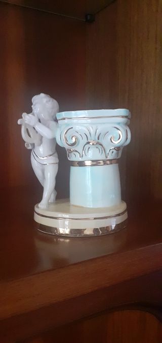 Vasetto con statuina