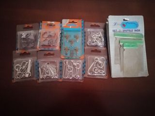 Ganci, moschettoni, spatole.