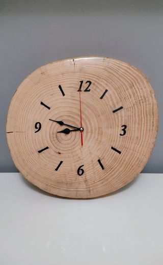 Orologio da parete in legno massello