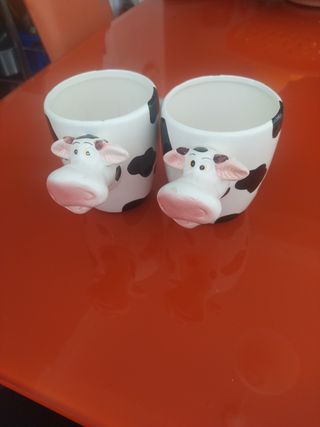 Due tazze con mucca